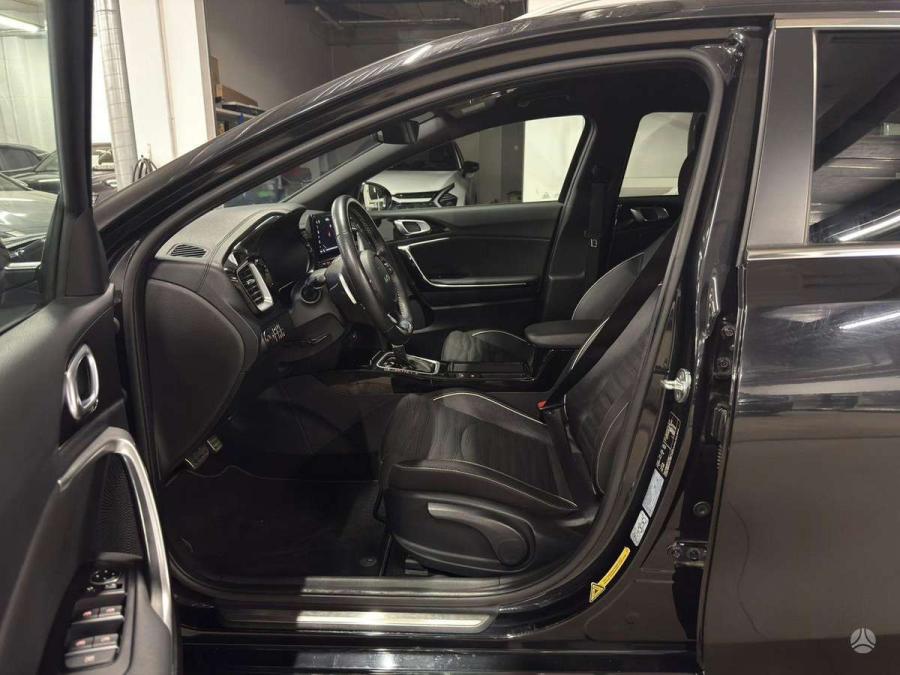 Black Kia Ceed 2023 in Vilnius, with an engine capacity of 1.48 L and mileage of 64 thousand km for 21900 €, photo 9 on AUTOMOTO.COM.LV