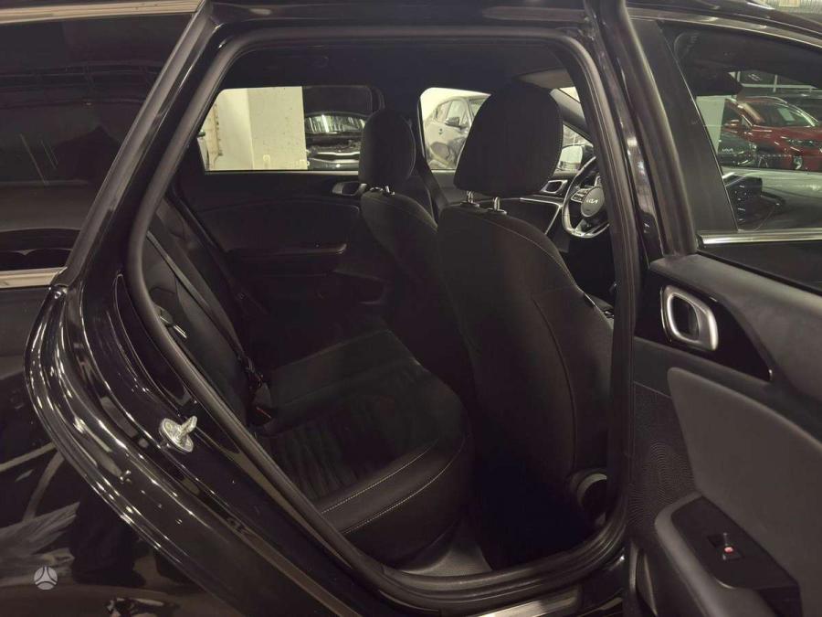 Black Kia Ceed 2023 in Vilnius, with an engine capacity of 1.48 L and mileage of 64 thousand km for 21900 €, photo 17 on AUTOMOTO.COM.LV