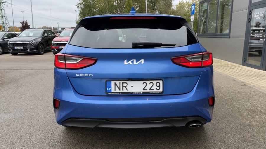 Blue Kia Ceed 2023 in Riga, with an engine capacity of 1.60 L and mileage of 145 thousand km for 11900 €, photo 4 on AUTOMOTO.COM.LV