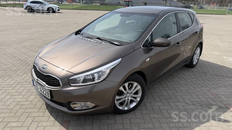 Brown Kia Ceed 2014 in Valmiera, with an engine capacity of 1.60 L and mileage of 210 thousand km for 5900 €, photo 1 on AUTOMOTO.COM.LV