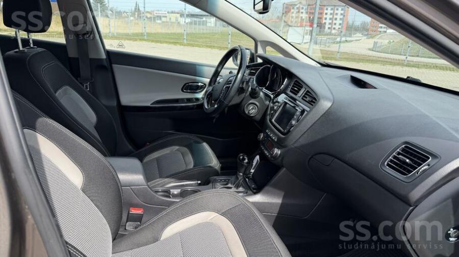 Brown Kia Ceed 2014 in Valmiera, with an engine capacity of 1.60 L and mileage of 210 thousand km for 5900 €, photo 15 on AUTOMOTO.COM.LV