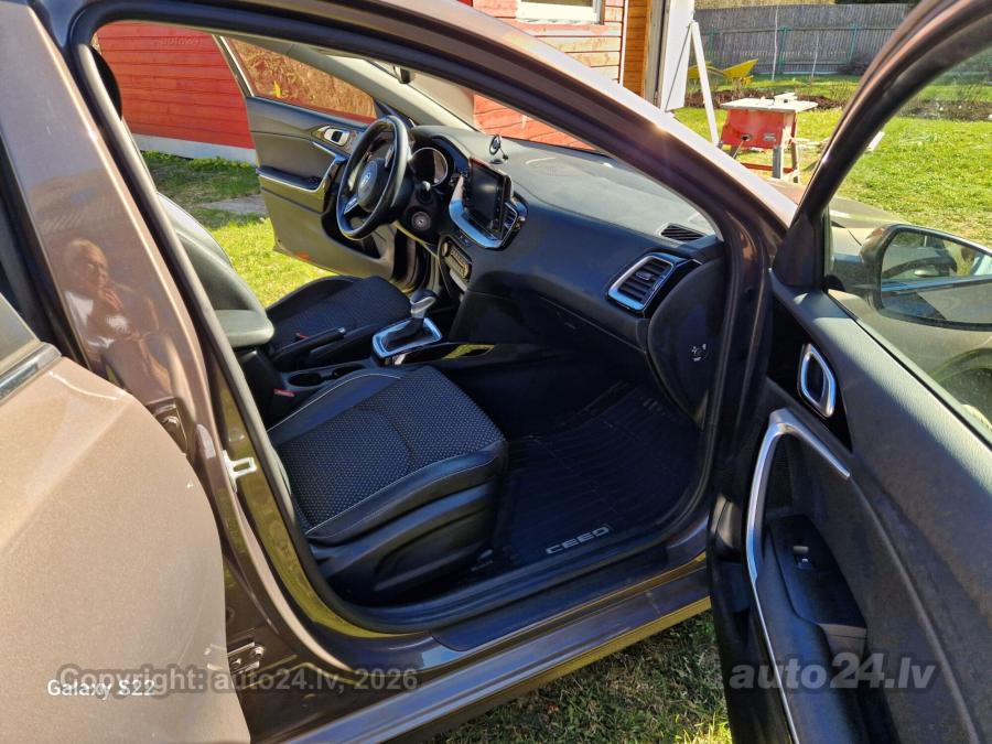 Brown Kia Ceed 2021 in Tallinn, with an engine capacity of 1.50 L and mileage of 61 thousand km for 13900 €, photo 16 on AUTOMOTO.COM.LV