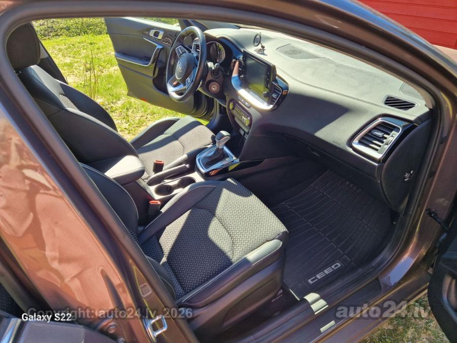 Brown Kia Ceed 2021 in Tallinn, with an engine capacity of 1.50 L and mileage of 61 thousand km for 13900 €, photo 28 on AUTOMOTO.COM.LV