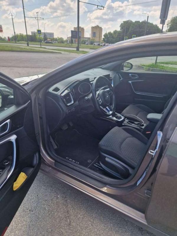 Brown Kia Ceed 2021 in Kaunas, with an engine capacity of 1.60 L and mileage of 104 thousand km for 8000 €, photo 7 on AUTOMOTO.COM.LV