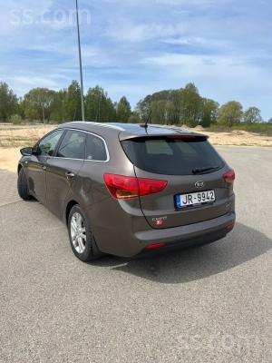 Brown Kia Ceed 2014 in Riga, with an engine capacity of 1.60 L and mileage of 193 thousand km for 6799 €, photo 5 on AUTOMOTO.COM.LV
