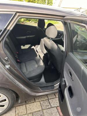 Brown Kia Ceed 2014 in Klaipeda, with an engine capacity of 1.40 L and mileage of 214 thousand km for 3150 €, photo 15 on AUTOMOTO.COM.LV