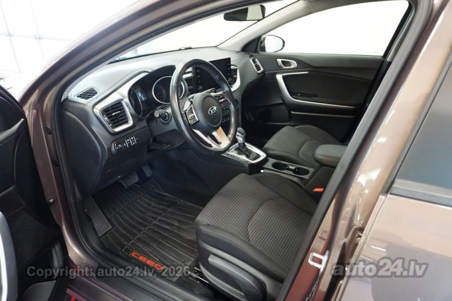 Brown Kia Ceed 2021 in Tartu, with an engine capacity of 1.50 L and mileage of 142 thousand km for 12490 €, photo 12 on AUTOMOTO.COM.LV