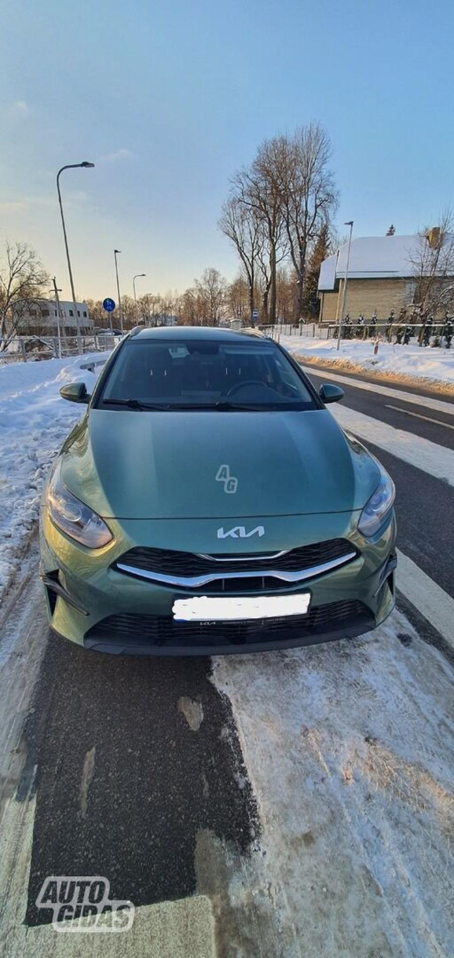 Green Kia Ceed 2022 in Vilnius, with an engine capacity of 1.50 L and mileage of 97 thousand km for 14500 €, photo 3 on AUTOMOTO.COM.LV