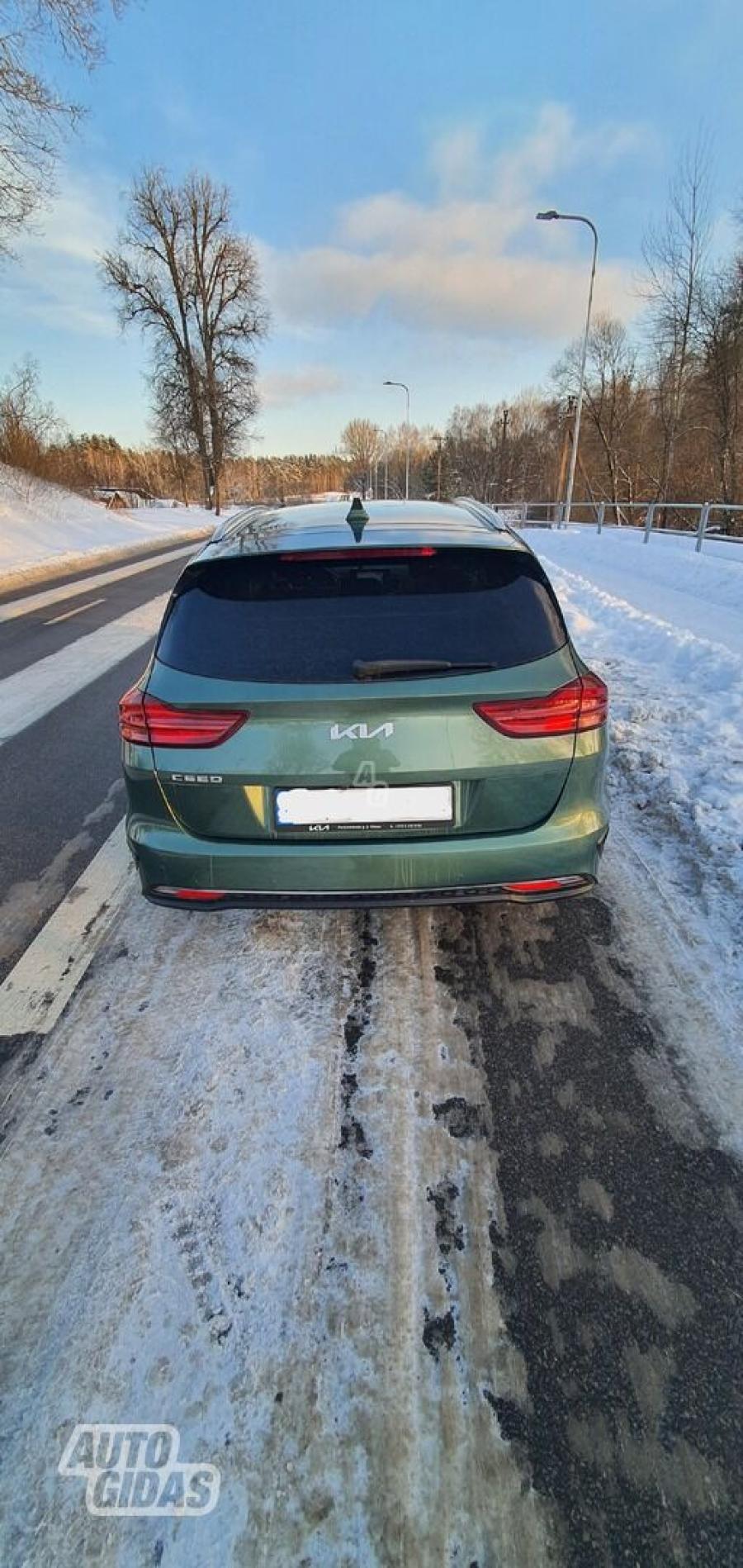 Green Kia Ceed 2022 in Vilnius, with an engine capacity of 1.50 L and mileage of 97 thousand km for 14500 €, photo 5 on AUTOMOTO.COM.LV