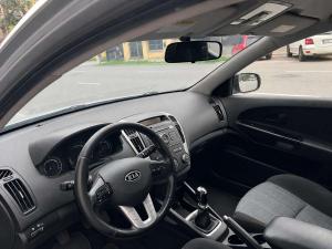 Grey Kia Ceed 2011 in Vilnius, with an engine capacity of 1.58 L and mileage of 234 thousand km for 1450 €, photo 12 on AUTOMOTO.COM.LV