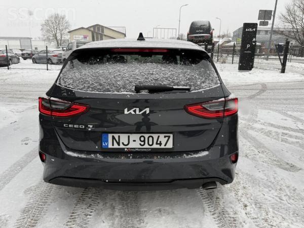 Grey Kia Ceed 2023 in Jelgava, with an engine capacity of 1.50 L and mileage of 90 thousand km for 16200 €, photo 6 on AUTOMOTO.COM.LV