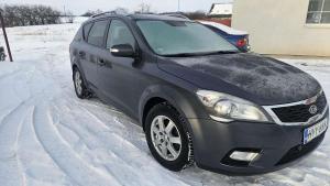 Grey Kia Ceed 2011 in Marijampole, with an engine capacity of 1.59 L and mileage of 260 thousand km for 1450 €, photo  on AUTOMOTO.COM.LV
