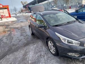 Grey Kia Ceed 2014 in Klaipeda, with an engine capacity of 1.59 L and mileage of 278 thousand km for 3600 €, photo 11 on AUTOMOTO.COM.LV