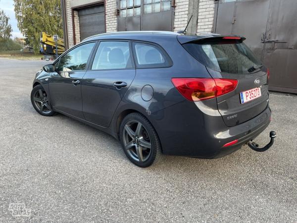 Grey Kia Ceed 2014 in Sakiai, with an engine capacity of 1.60 L and mileage of 244 thousand km for 2999 €, photo 8 on AUTOMOTO.COM.LV
