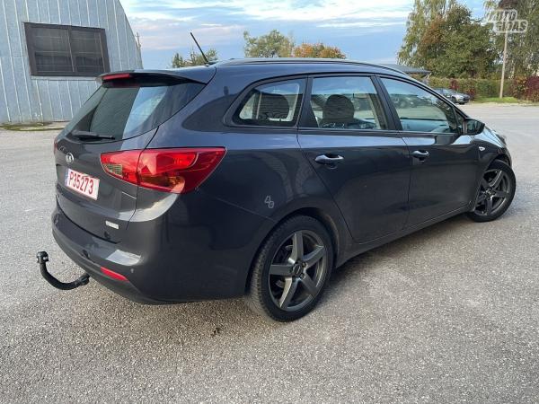 Grey Kia Ceed 2014 in Sakiai, with an engine capacity of 1.60 L and mileage of 244 thousand km for 2999 €, photo 10 on AUTOMOTO.COM.LV