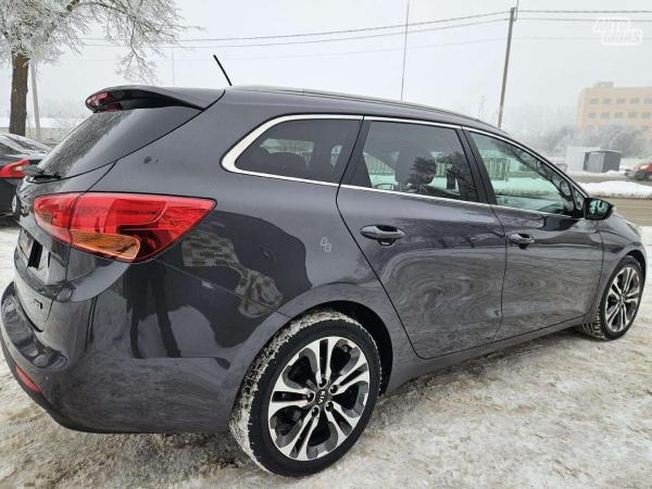 Grey Kia Ceed 2015 in Siauliai, with an engine capacity of 1.60 L and mileage of 221 thousand km for 6250 €, photo 5 on AUTOMOTO.COM.LV
