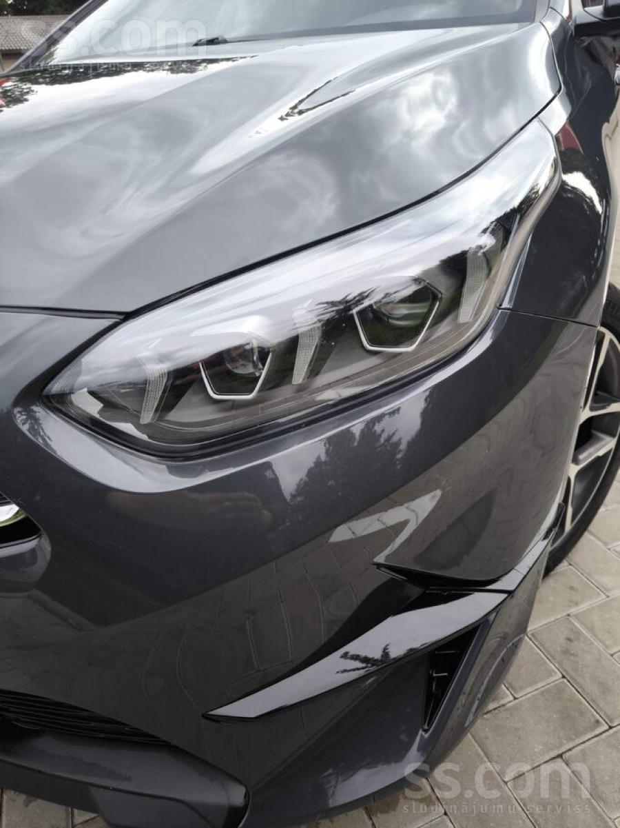 Grey Kia Ceed 2023 in Riga, with an engine capacity of 1.50 L and mileage of 66 thousand km for 15500 €, photo 12 on AUTOMOTO.COM.LV