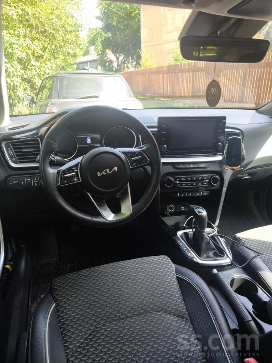 Grey Kia Ceed 2023 in Riga, with an engine capacity of 1.50 L and mileage of 66 thousand km for 15500 €, photo 21 on AUTOMOTO.COM.LV