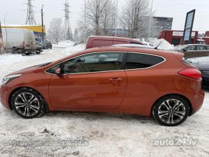 Orange Kia Ceed 2014 in Tallinn, with an engine capacity of 1.60 L and mileage of 188 thousand km for 6375 €, photo 12 on AUTOMOTO.COM.LV