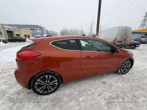 Orange Kia Ceed 2014 in Tallinn, with an engine capacity of 1.60 L and mileage of 188 thousand km for 6375 €, photo 13 on AUTOMOTO.COM.LV