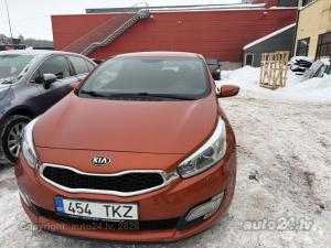 Orange Kia Ceed 2014 in Tallinn, with an engine capacity of 1.60 L and mileage of 188 thousand km for 6375 €, photo 14 on AUTOMOTO.COM.LV
