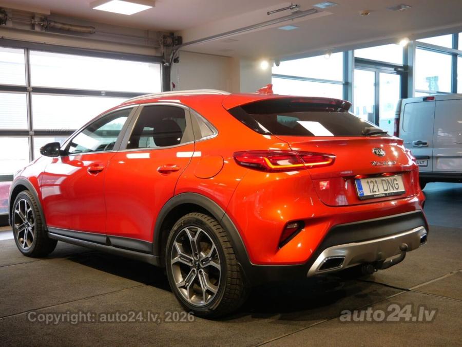 Orange Kia Ceed 2021 in Tallinn, with an engine capacity of 1.50 L and mileage of 65 thousand km for 17500 €, photo 4 on AUTOMOTO.COM.LV