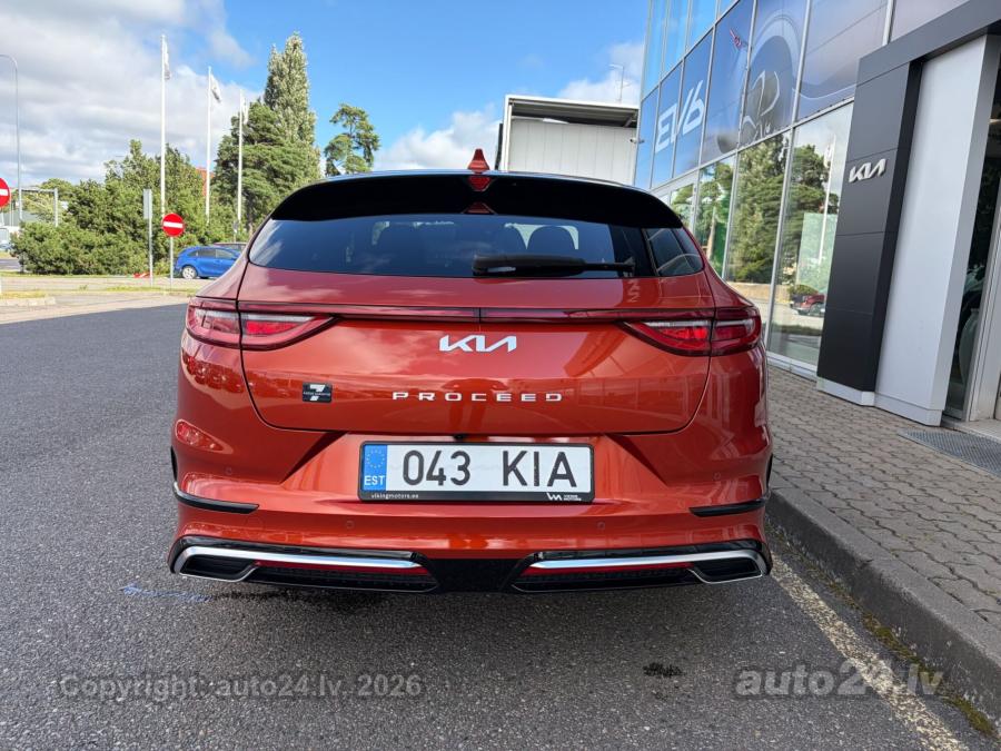 Orange Kia Ceed 2025 in Tallinn, with an engine capacity of 1.50 L and mileage of 16 thousand km for 29900 €, photo 4 on AUTOMOTO.COM.LV