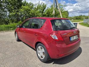 Red Kia Ceed 2011 in Vilnius, with an engine capacity of 1.40 L and mileage of 194 thousand km for 2000 €, photo 6 on AUTOMOTO.COM.LV