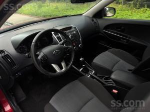 Red Kia Ceed 2012 in Riga, with an engine capacity of 1.40 L and mileage of 94 thousand km for 4500 €, photo 7 on AUTOMOTO.COM.LV