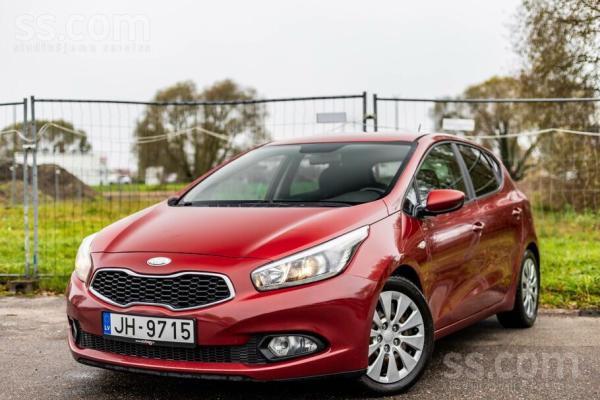 Red Kia Ceed 2013 in Riga, with an engine capacity of 1.40 L and mileage of 244 thousand km for 4990 €, photo 1 on AUTOMOTO.COM.LV