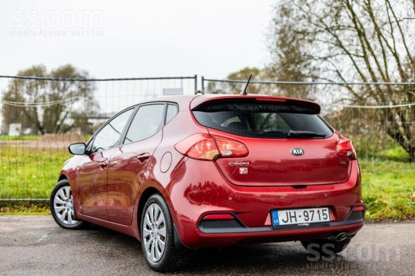 Red Kia Ceed 2013 in Riga, with an engine capacity of 1.40 L and mileage of 244 thousand km for 4990 €, photo 7 on AUTOMOTO.COM.LV