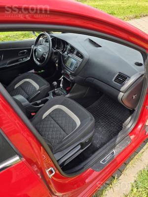 Red Kia Ceed 2017 in Riga, with an engine capacity of 1.60 L and mileage of 136 thousand km for 6999 €, photo 11 on AUTOMOTO.COM.LV