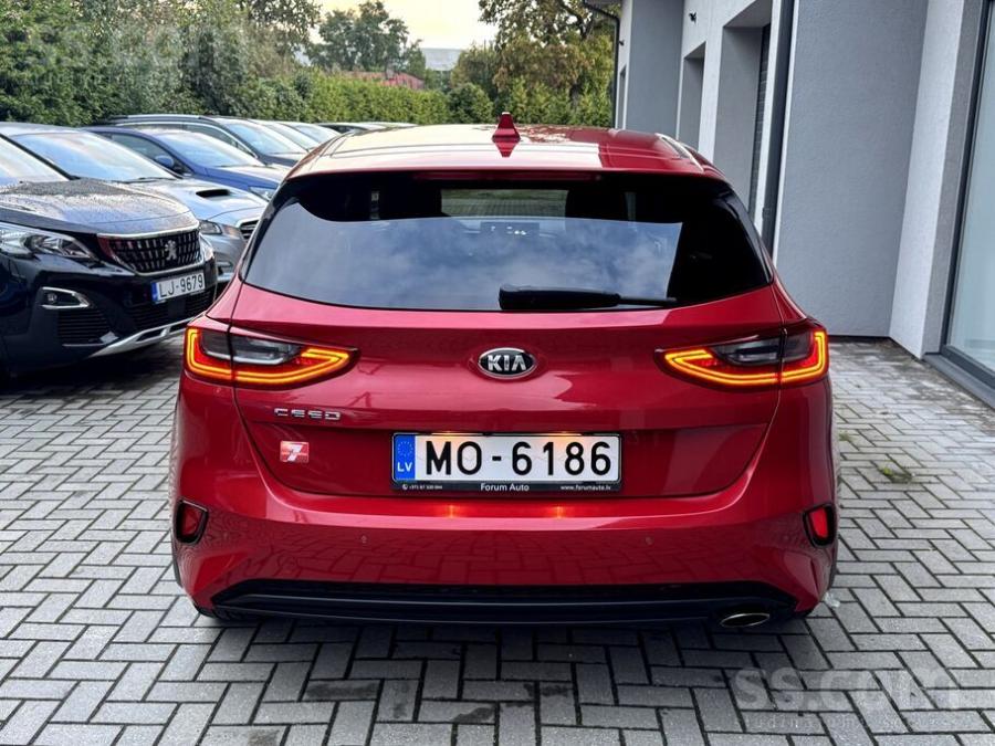Red Kia Ceed 2020 in Riga, with an engine capacity of 1.40 L and mileage of 95 thousand km for 11500 €, photo 6 on AUTOMOTO.COM.LV