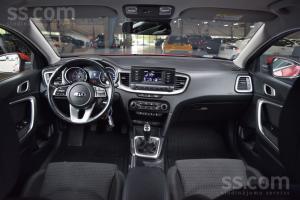 Red Kia Ceed 2021 in Riga, with an engine capacity of 1.60 L and mileage of 175 thousand km for 8400 €, photo 5 on AUTOMOTO.COM.LV
