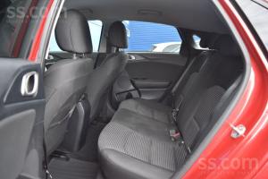 Red Kia Ceed 2021 in Riga, with an engine capacity of 1.60 L and mileage of 175 thousand km for 8400 €, photo 13 on AUTOMOTO.COM.LV