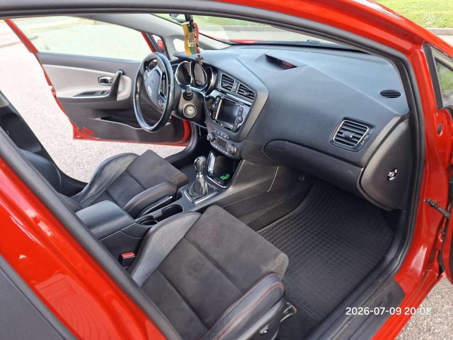 Red Kia Ceed 2014 in Kaunas, with an engine capacity of 1.59 L and mileage of 186 thousand km for 6100 €, photo 3 on AUTOMOTO.COM.LV