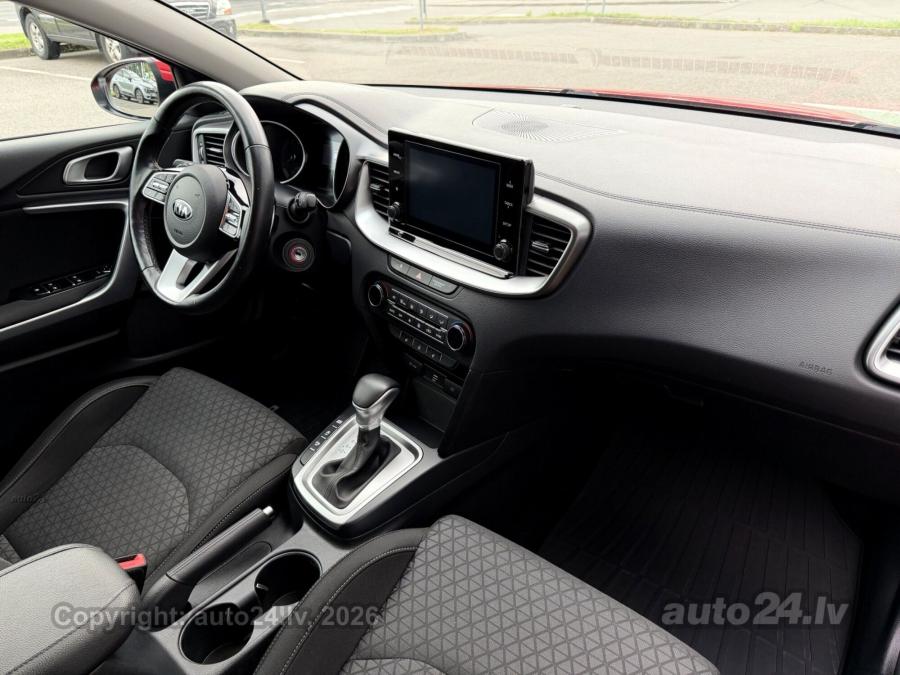 Red Kia Ceed 2021 in Tallinn, with an engine capacity of 1.60 L and mileage of 129 thousand km for 13900 €, photo 5 on AUTOMOTO.COM.LV