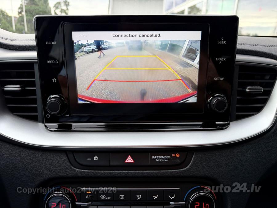 Red Kia Ceed 2021 in Tallinn, with an engine capacity of 1.60 L and mileage of 129 thousand km for 13900 €, photo 10 on AUTOMOTO.COM.LV