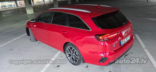Red Kia Ceed 2024 in Parnu, with an engine capacity of 1.50 L and mileage of 15 thousand km for 27300 €, photo 4 on AUTOMOTO.COM.LV