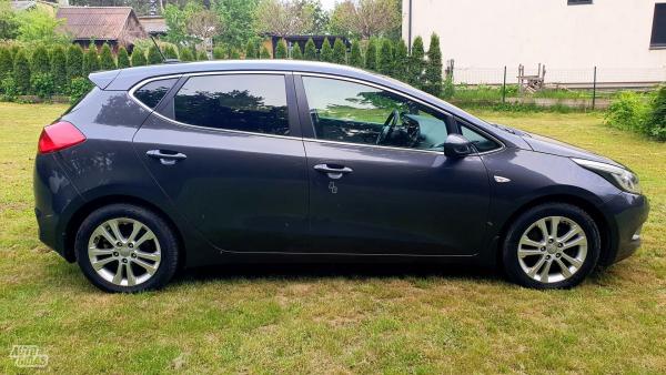 Violet Kia Ceed 2014 in Kaunas, with an engine capacity of 1.60 L and mileage of 291 thousand km for 5100 €, photo 4 on AUTOMOTO.COM.LV