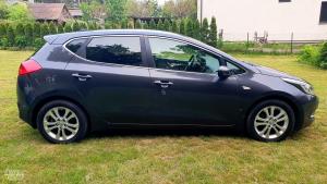 Violet Kia Ceed 2014 in Kaunas, with an engine capacity of 1.60 L and mileage of 291 thousand km for 5100 €, photo 5 on AUTOMOTO.COM.LV