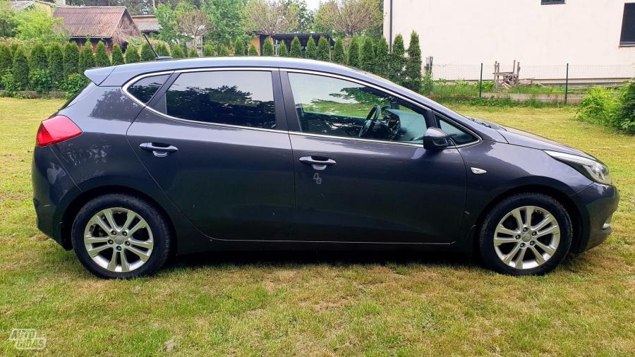 Violet Kia Ceed 2014 in Kaunas, with an engine capacity of 1.60 L and mileage of 291 thousand km for 5100 €, photo 5 on AUTOMOTO.COM.LV