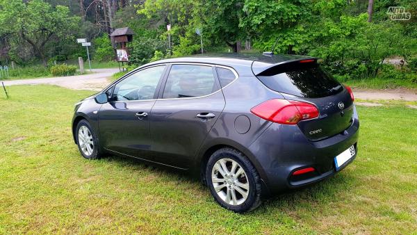 Violet Kia Ceed 2014 in Kaunas, with an engine capacity of 1.60 L and mileage of 291 thousand km for 5100 €, photo 6 on AUTOMOTO.COM.LV