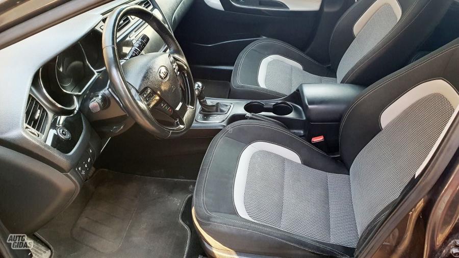 Violet Kia Ceed 2014 in Kaunas, with an engine capacity of 1.60 L and mileage of 291 thousand km for 5100 €, photo 16 on AUTOMOTO.COM.LV