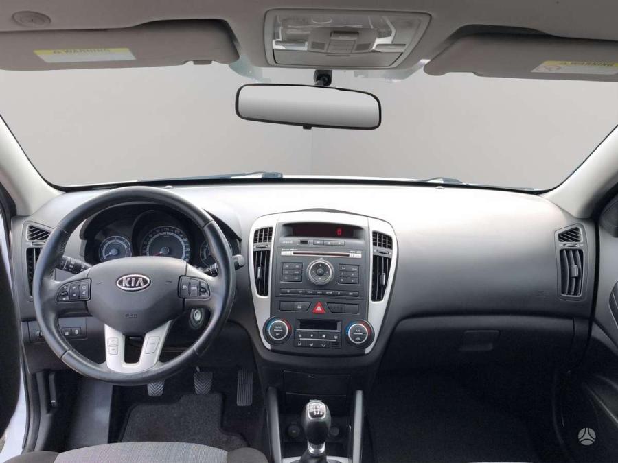 White Kia Ceed 2012 in Vilnius, with an engine capacity of 1.60 L and mileage of 189 thousand km for 3999 €, photo 12 on AUTOMOTO.COM.LV