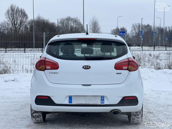 White Kia Ceed 2013 in Taurage, with an engine capacity of 1.40 L and mileage of 246 thousand km for 3950 €, photo 6 on AUTOMOTO.COM.LV