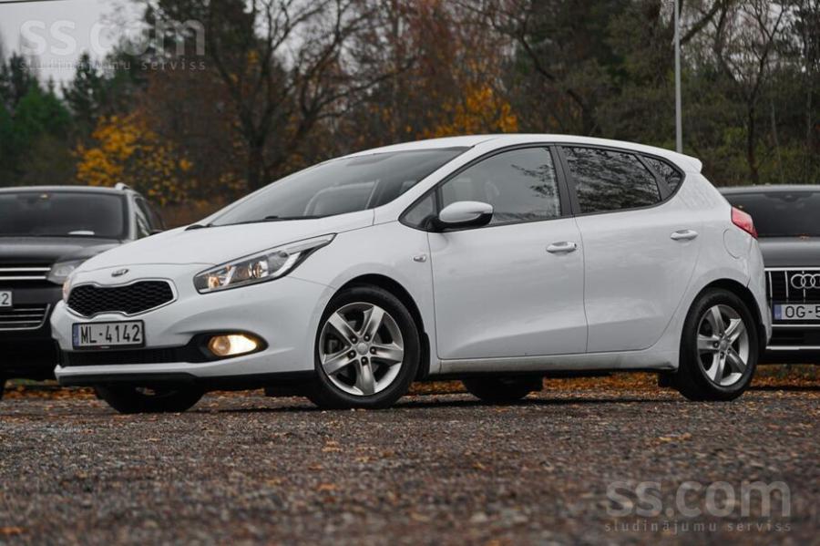 White Kia Ceed 2013 in Riga, with an engine capacity of 1.40 L and mileage of 252 thousand km for 2990 €, photo 1 on AUTOMOTO.COM.LV