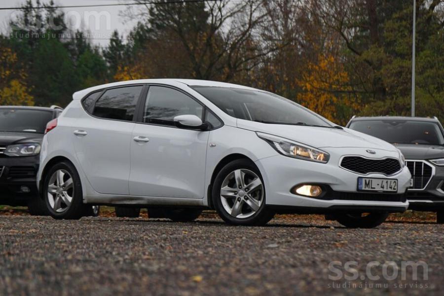 White Kia Ceed 2013 in Riga, with an engine capacity of 1.40 L and mileage of 252 thousand km for 2990 €, photo 3 on AUTOMOTO.COM.LV