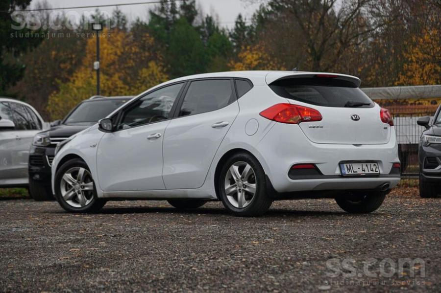 White Kia Ceed 2013 in Riga, with an engine capacity of 1.40 L and mileage of 252 thousand km for 2990 €, photo 4 on AUTOMOTO.COM.LV