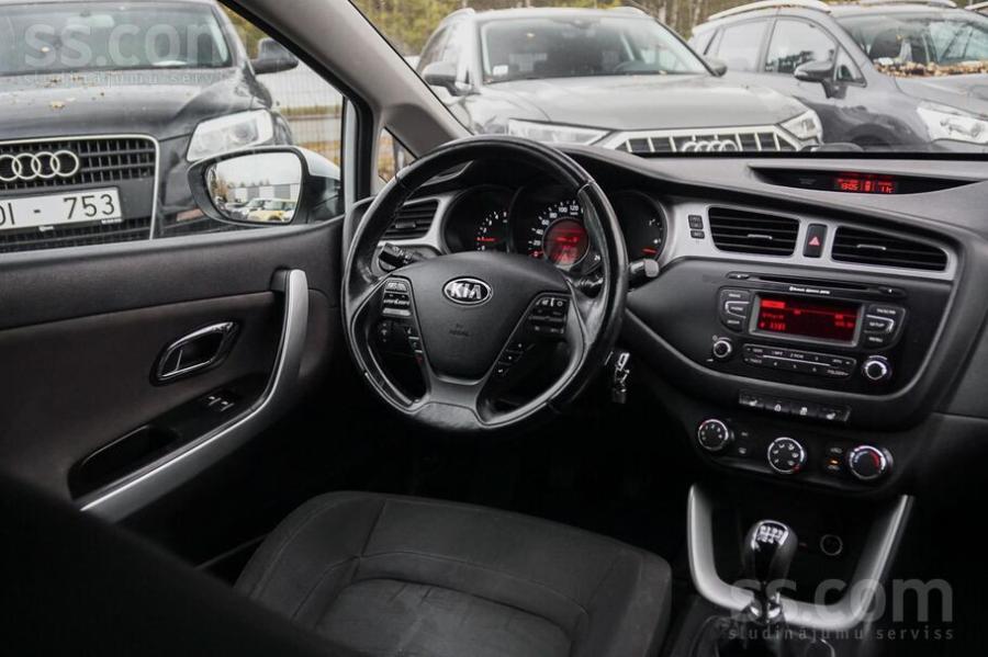 White Kia Ceed 2013 in Riga, with an engine capacity of 1.40 L and mileage of 252 thousand km for 2990 €, photo 8 on AUTOMOTO.COM.LV